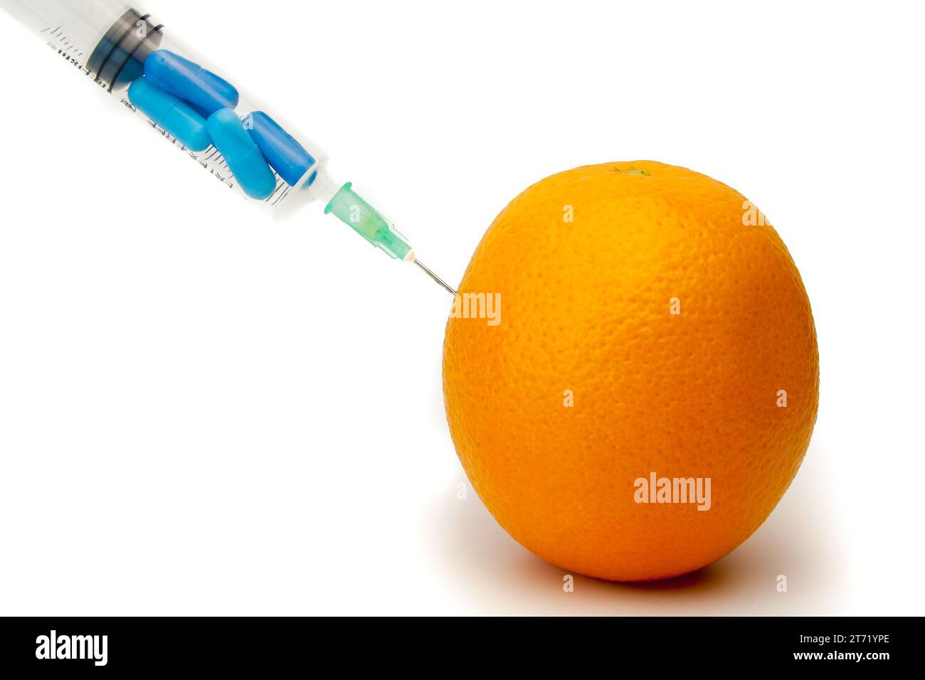 detail of a injection and a orange; detail of a injection and a orange ...