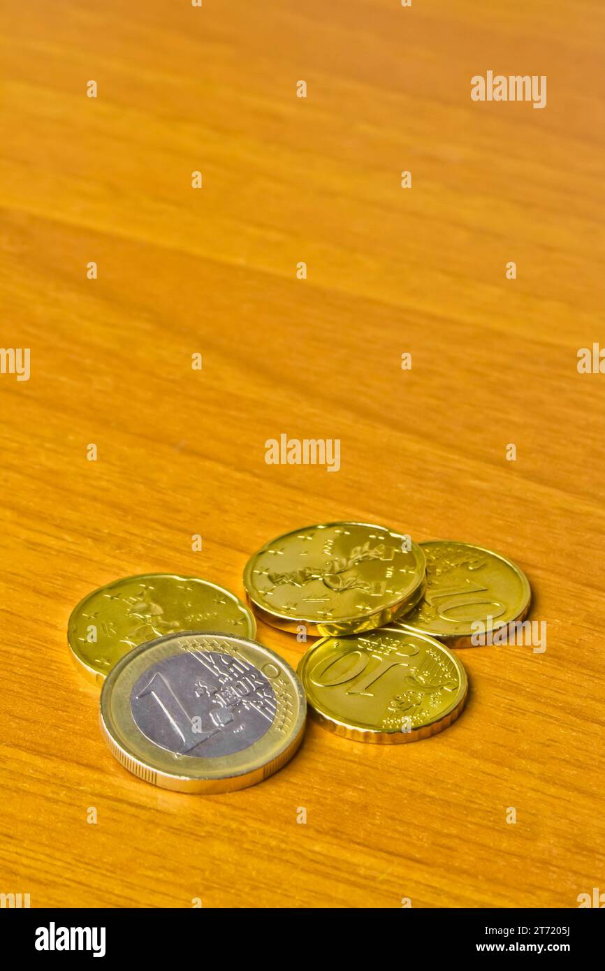 Euro coin on wood hi-res stock photography and images - Alamy