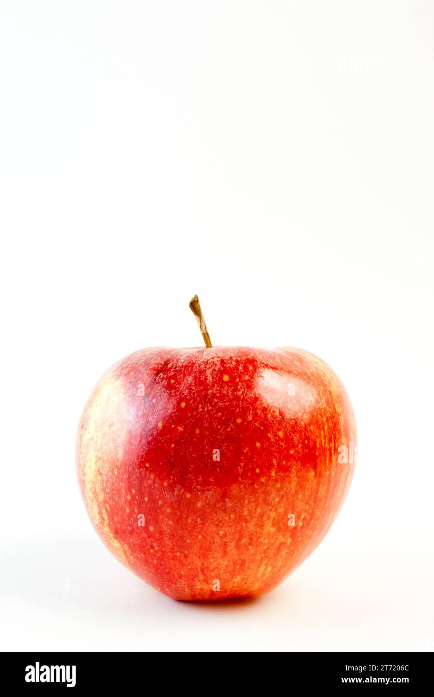 detail of red apple on white background Stock Photo - Alamy
