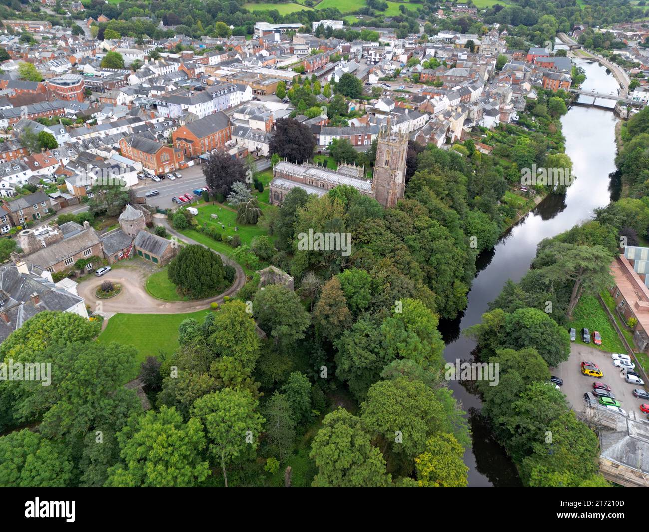 Aerial drone view of Tiverton Castle, St Peter's Church & the River Exe ...
