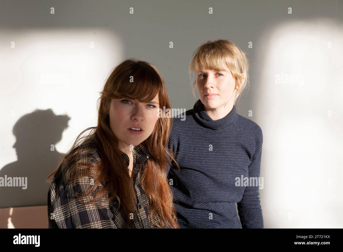 Women in shadow hi-res stock photography and images - Alamy