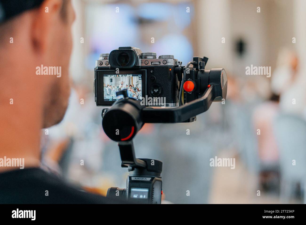 Filming of the event. Videography Stock Photo - Alamy