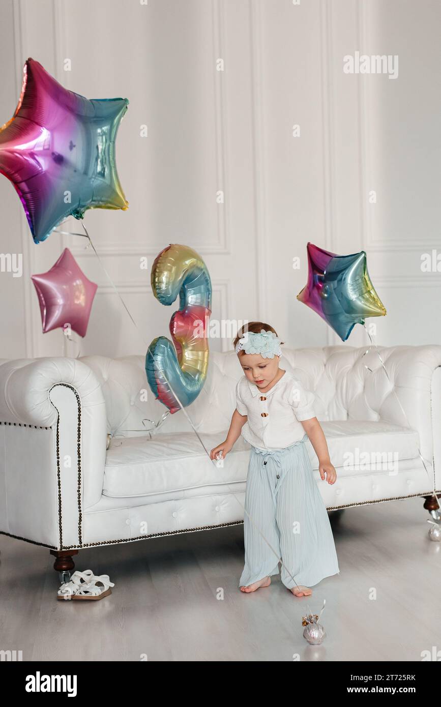 Child celebrating her three years anniversary Stock Photo - Alamy