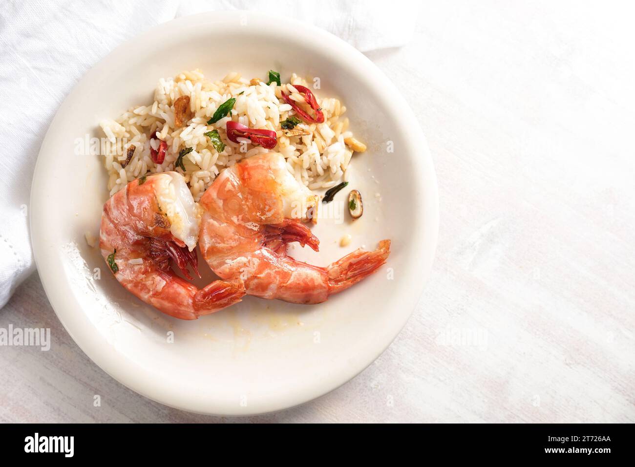 Large prawns or shrimps with spicy rice, garlic, red chili pepper and ...