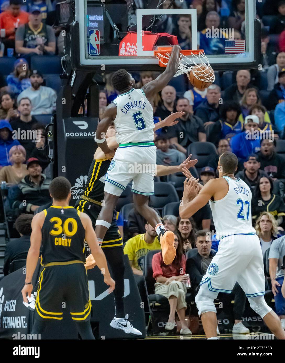 San Francisco, USA. 12th Nov, 2023. Anthony Edwards (C) of Minnesota Timberwolves dunks during ...