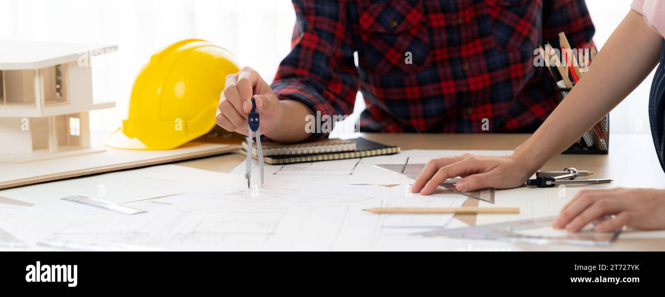 Cropped image of cooperative architect team decide and work together on ...