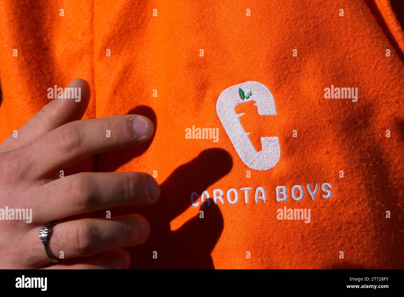 The "Carota Boys" logo is seen on a carrot costume worn by Jannik ...
