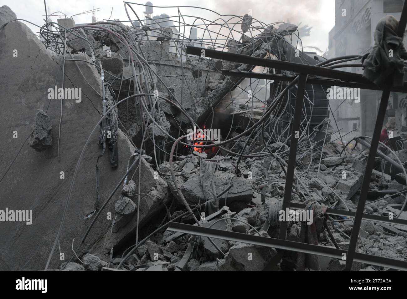 Palestinians inspect the destroyed house of Ghanem family, following an ...