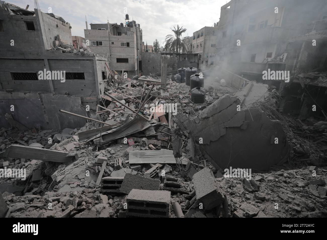 Bureij refugee camp, Palestine. 13 November, 2023. Palestinians inspect ...