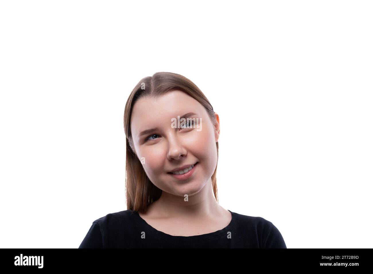 Cunning schoolgirl with blond hair on a white background Stock Photo ...