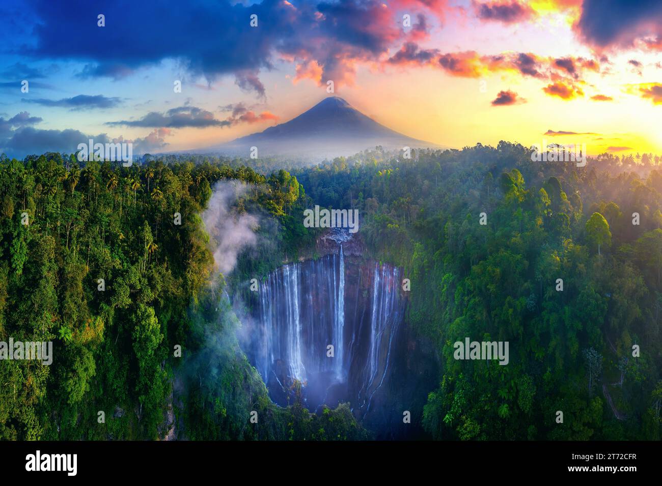 Tumpak Sewu Waterfall and Semeru mountain at sunrise, Indonesia Stock ...