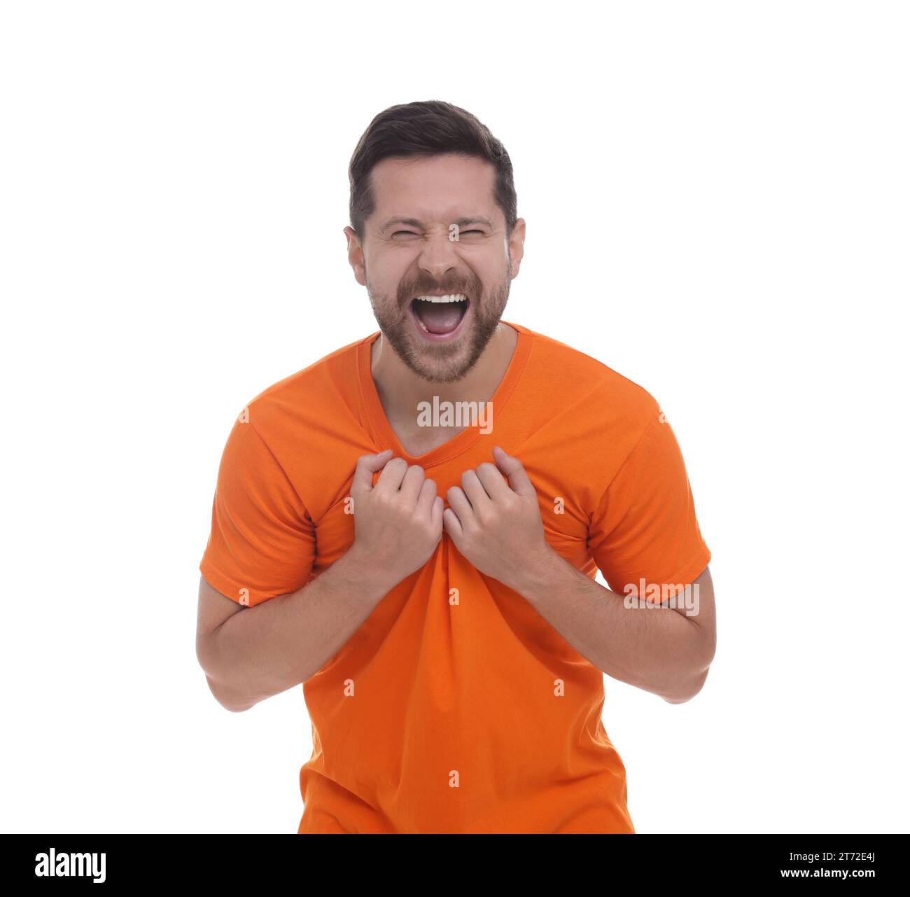 Emotional sports fan celebrating on white background Stock Photo - Alamy