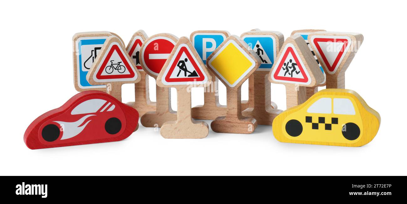 Set of wooden road signs and cars isolated on white. Children's toy ...