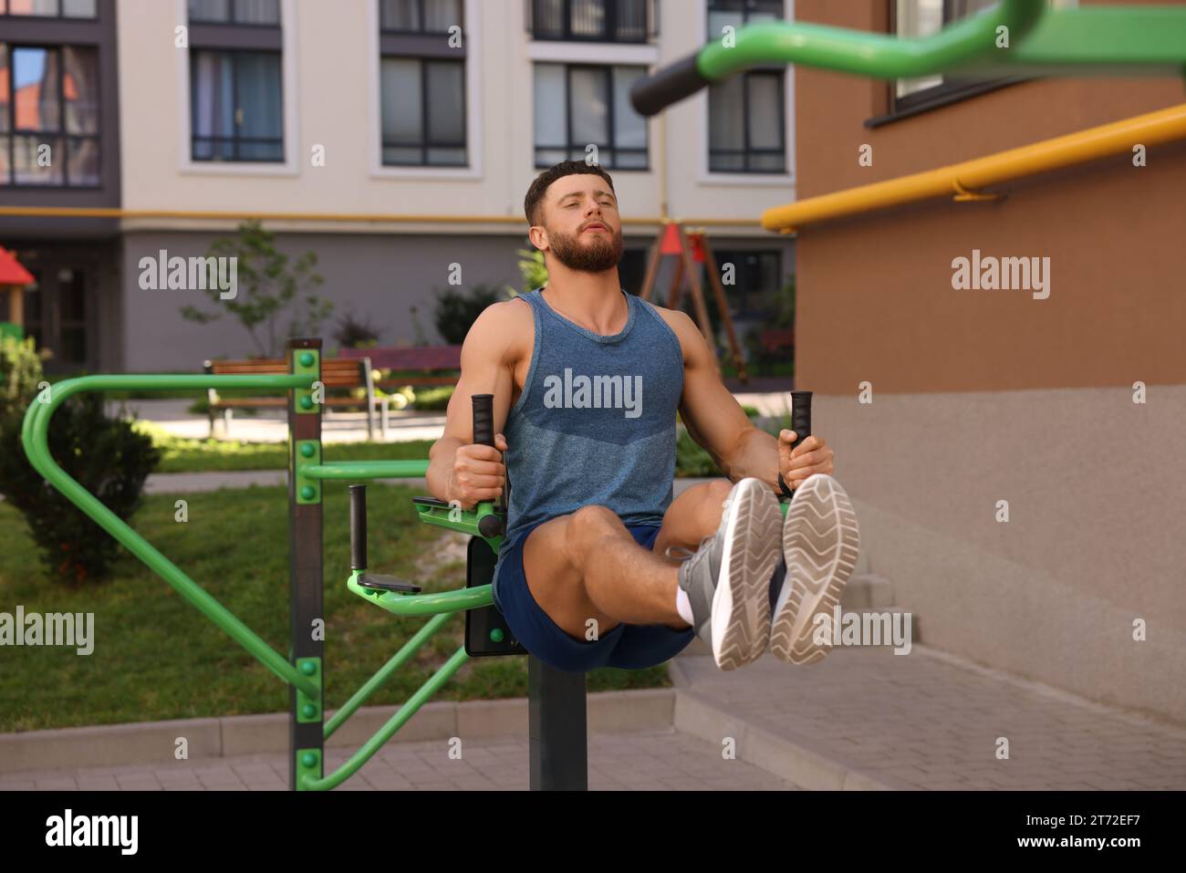 Gym machine leg lift hi-res stock photography and images - Alamy