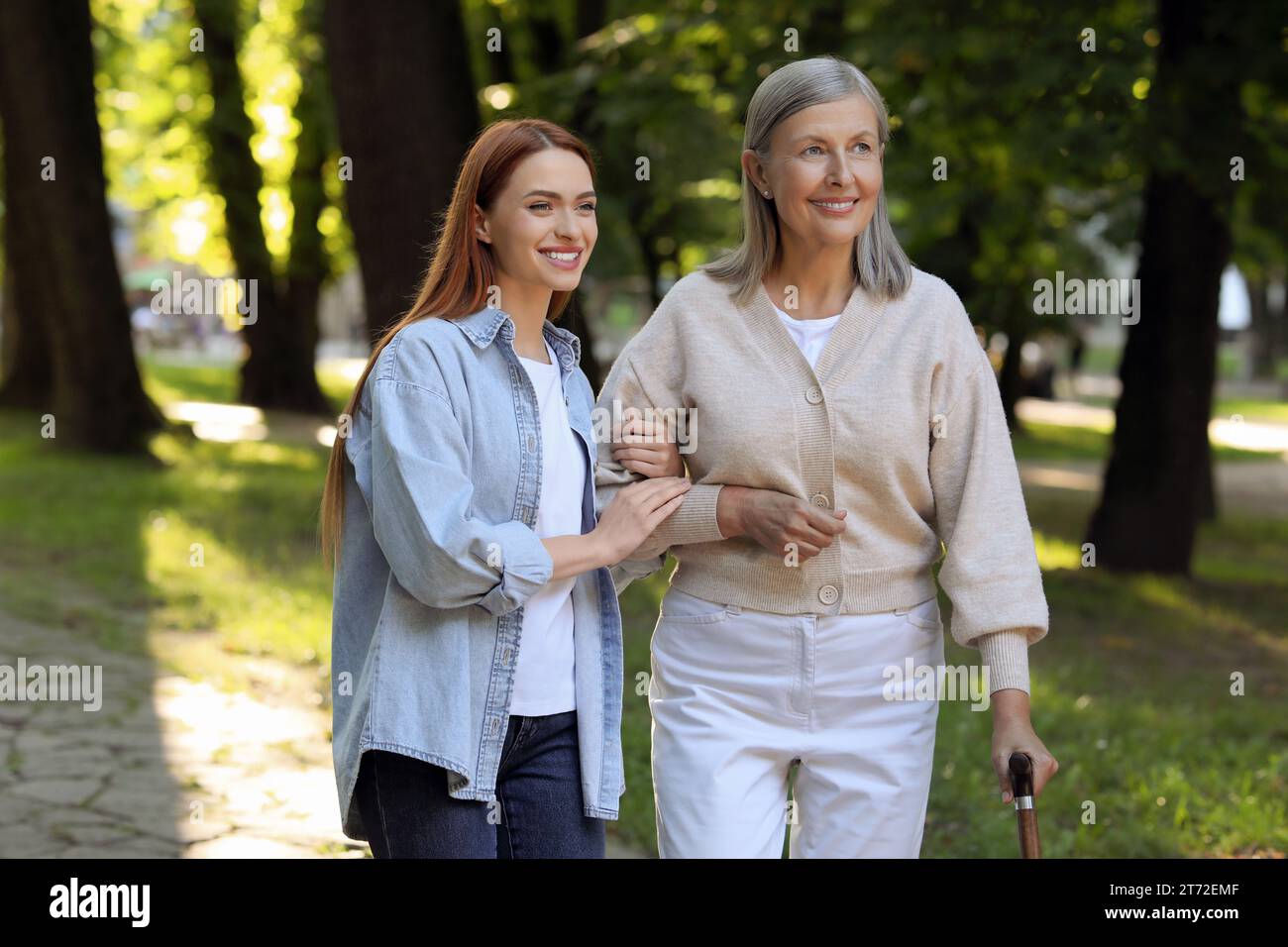 Lady with cane hi-res stock photography and images - Alamy