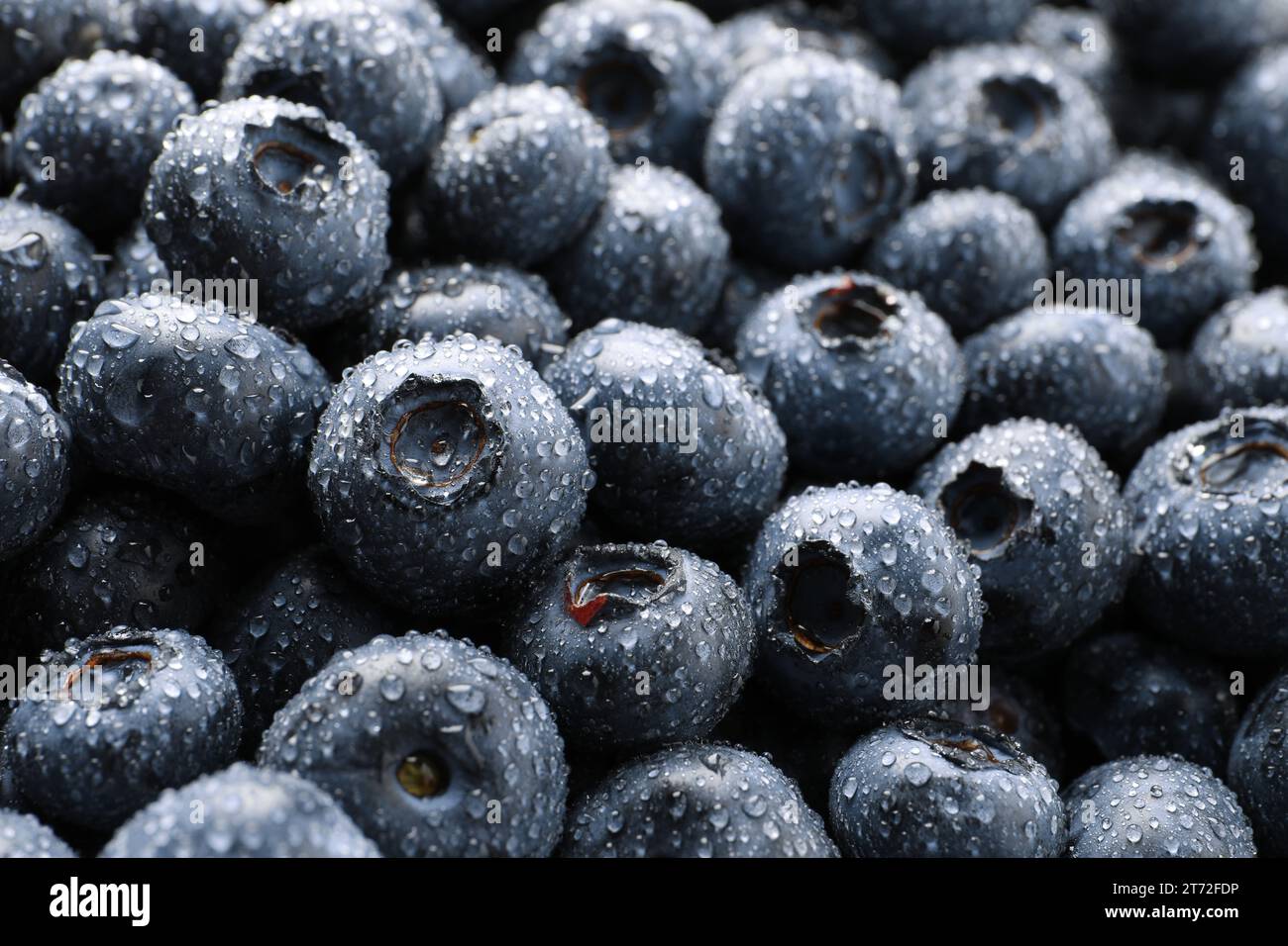 Wet fresh blueberries as background, closeup view Stock Photo - Alamy