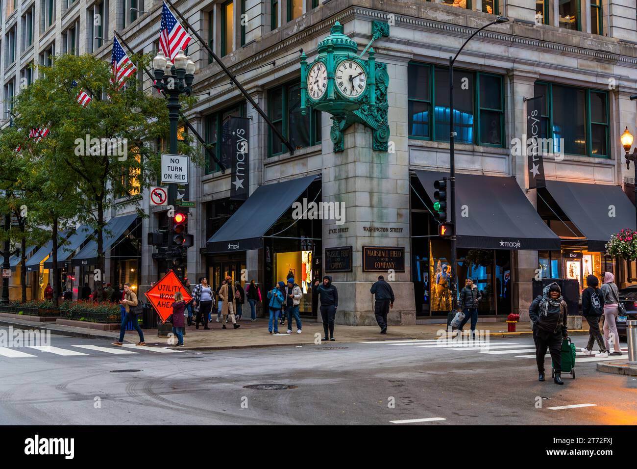 Iconic clock on the Marshall Field Building (now home to Macy's) on ...