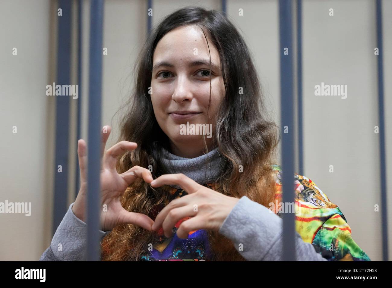 Sasha Skochilenko, a 33 year-old artist and musician shows a heart ...