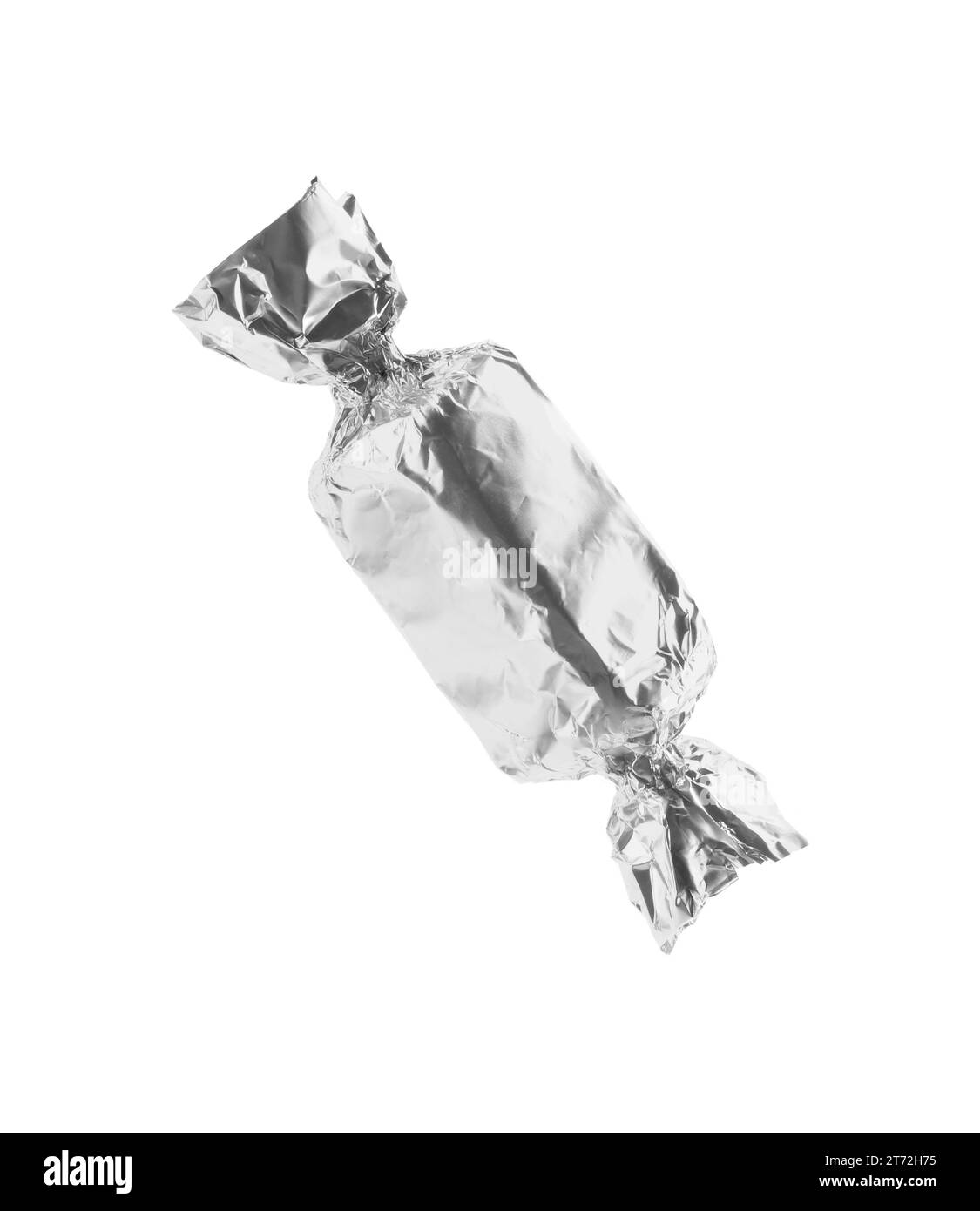 Tasty candy in silver wrapper isolated on white Stock Photo - Alamy