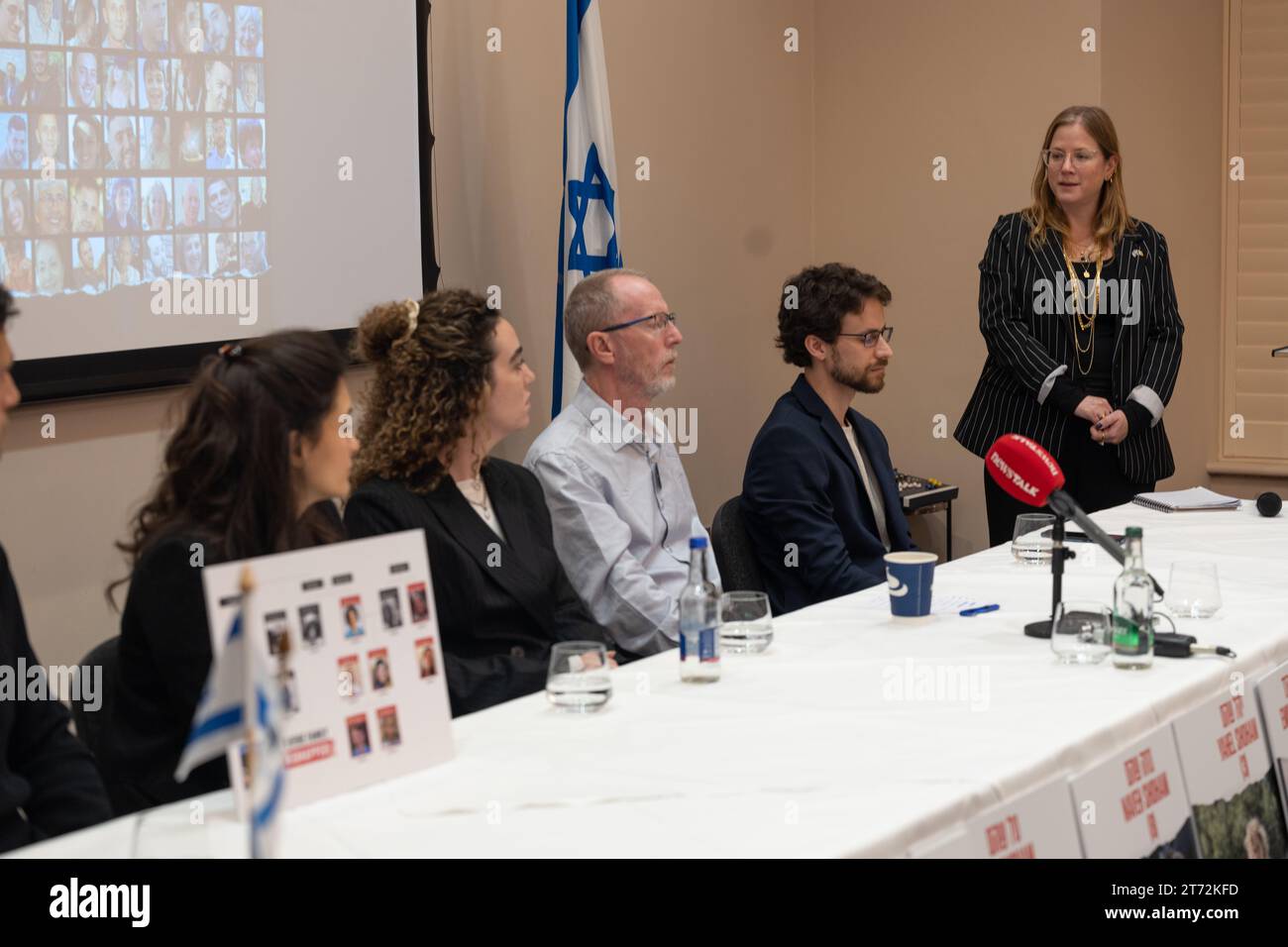 Israeli Ambassador Dana Erlich (right) introducing families of hostages ...