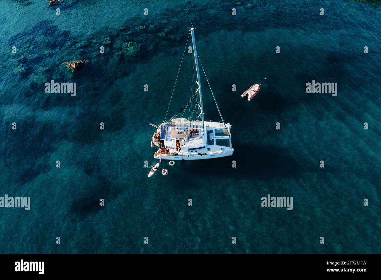 Aerial view anchored catamaran yacht hi-res stock photography and ...