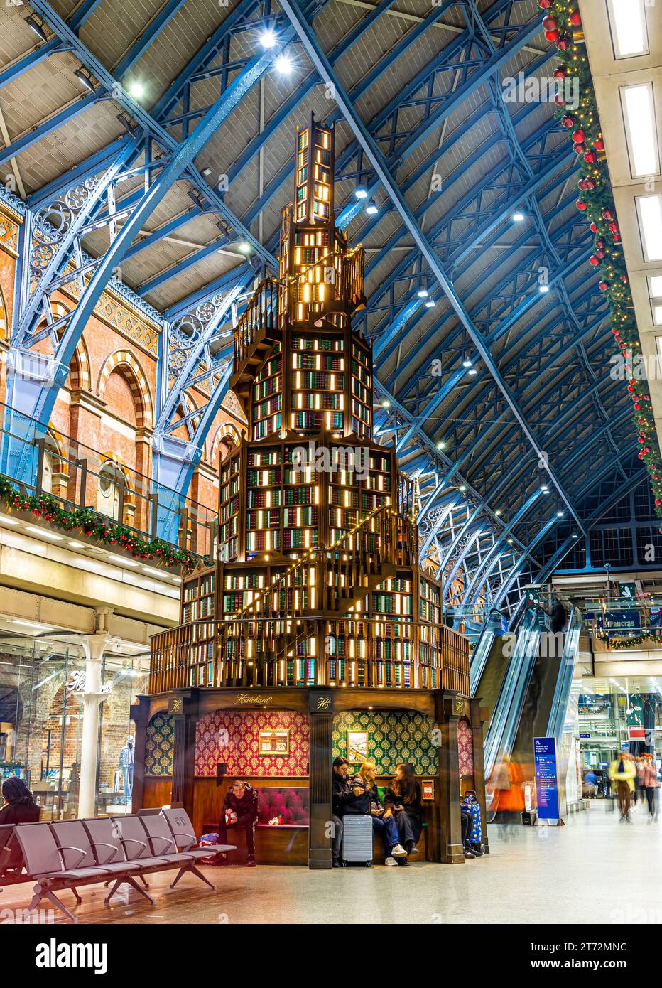 Christmas tree made of books at St Pancras station in London in 2023 ...