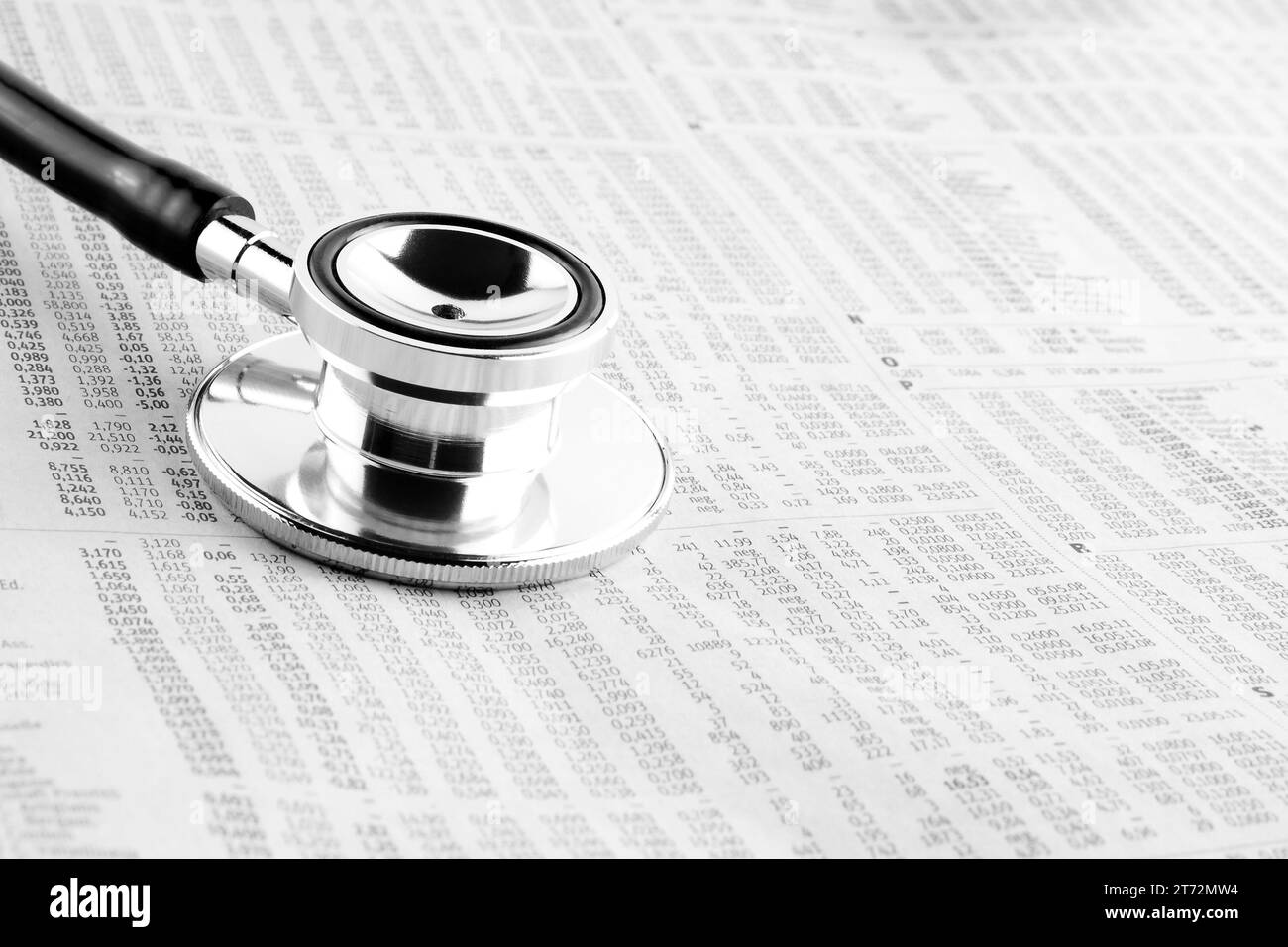 detail of a stethoscope on financial newspaper Stock Photo - Alamy