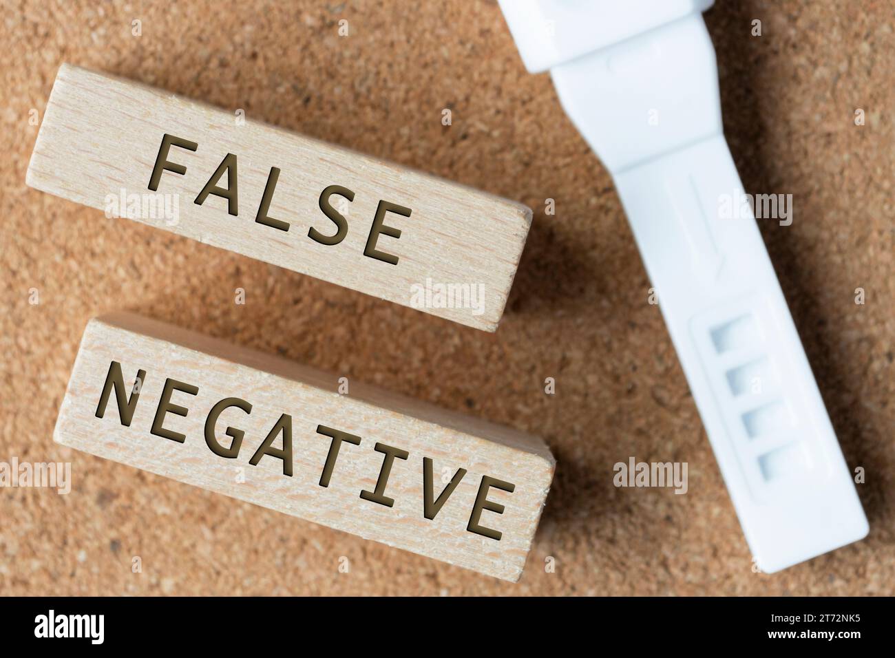 False negative words on wooden block with pregnancy test kit Stock ...