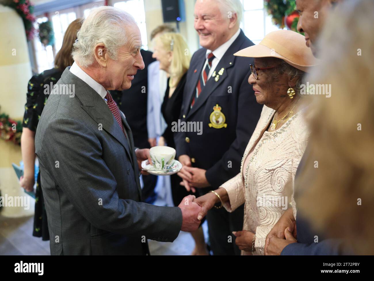 King Charles III's shakes hands with Jessie Stephens, sitter of the ...