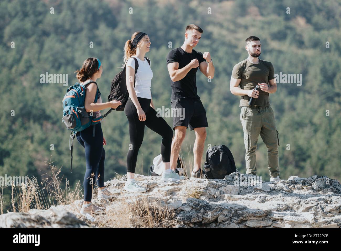 Exploring the Wilderness. Adventurous Hikers Enjoying a Sunny Day in ...