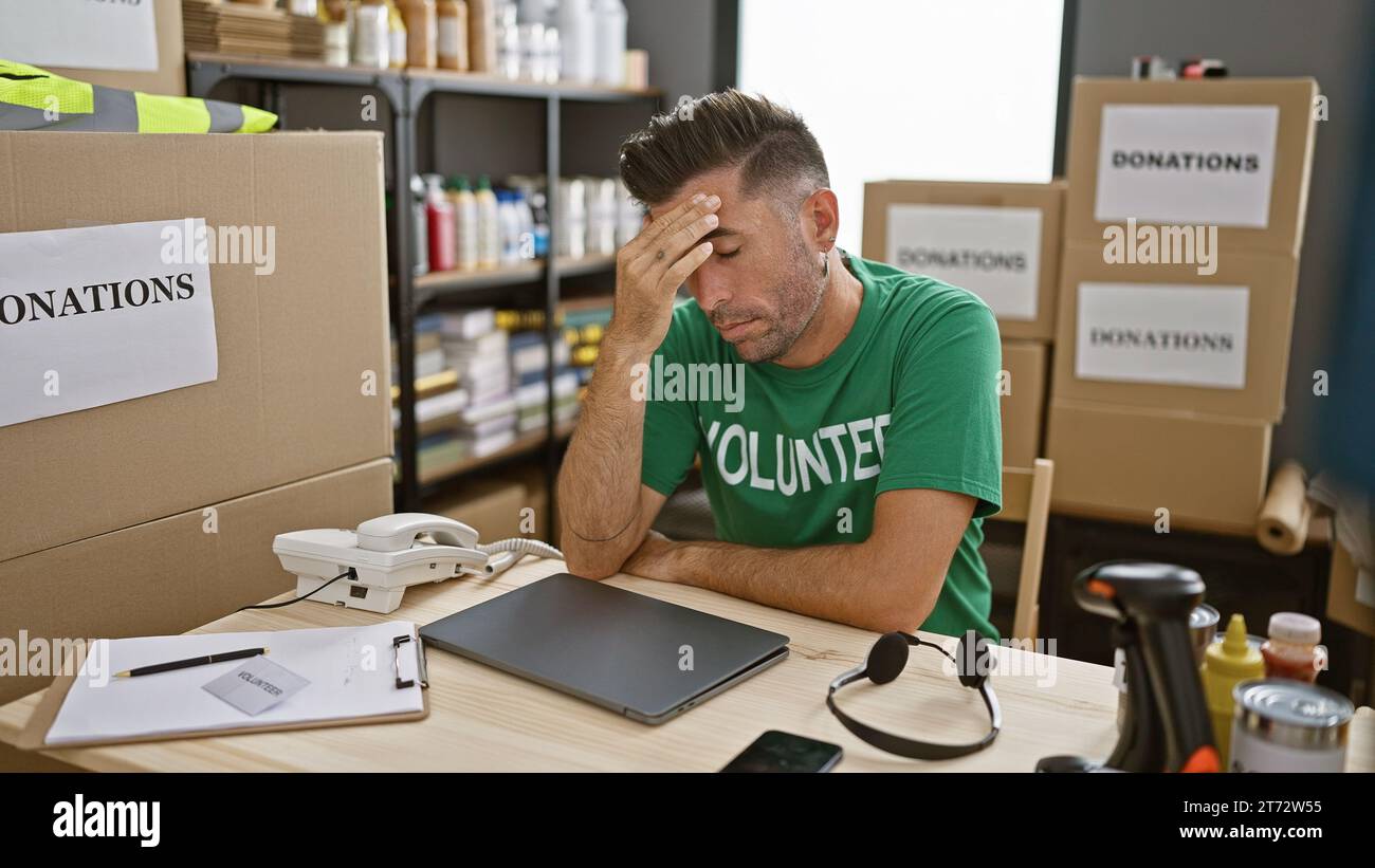 Stressed-out young hispanic man, a handsome volunteer, seriously ...