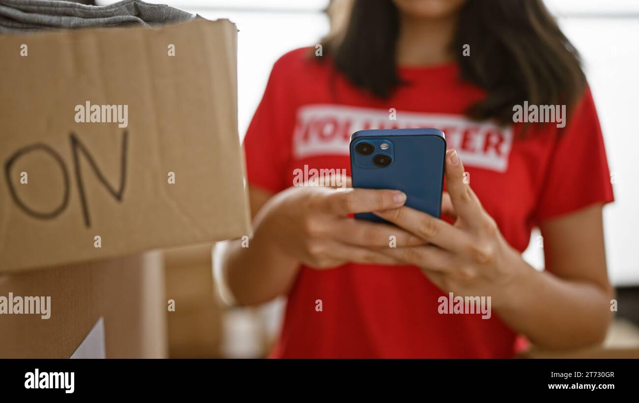 Tireless female volunteer's hands, a resilient hispanic woman ...