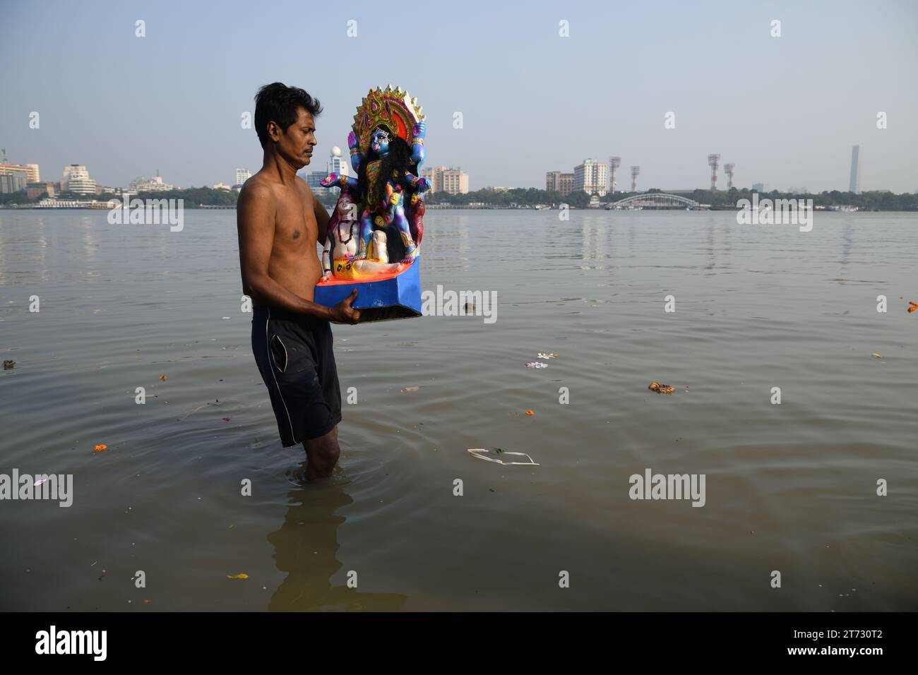 Kolkata, India. 13th Nov, 2023. Kali idol immersion in the Ganges. The ...