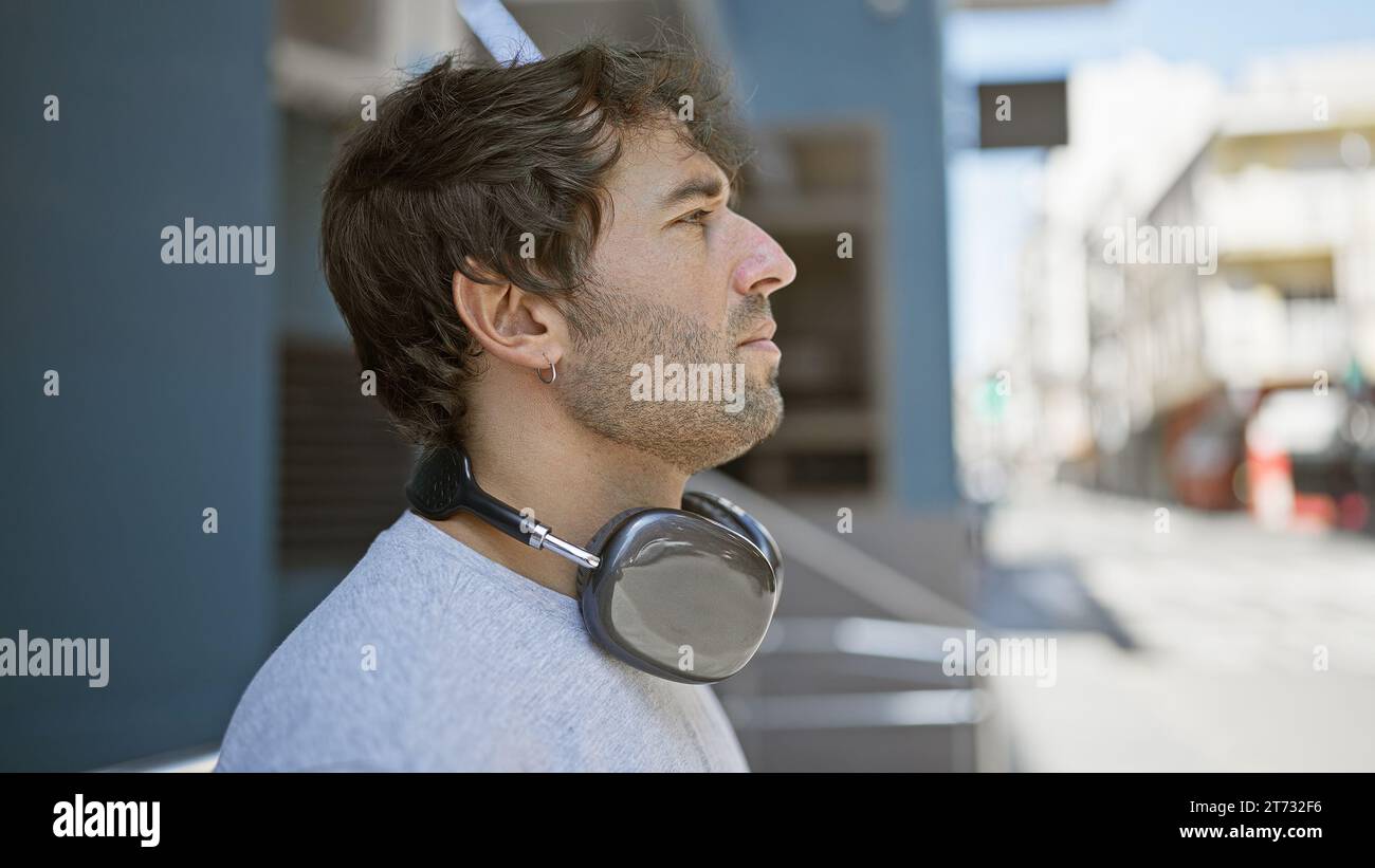 Cool, serious young guy with blond beard, rocking an urban lifestyle ...