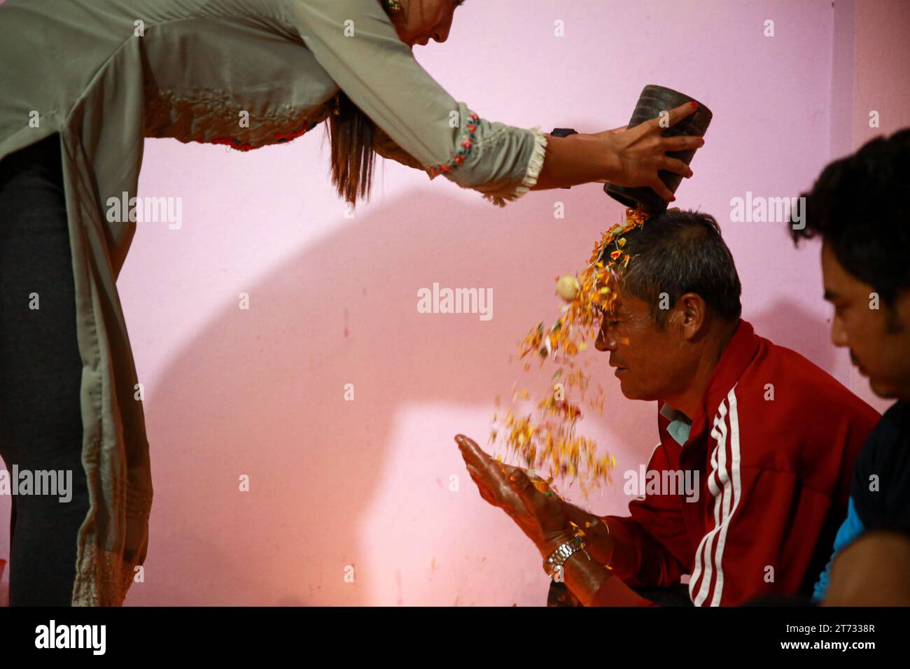 Bhaktapur, Bagmati, Nepal. 13th Nov, 2023. A Family member clelebrates ...