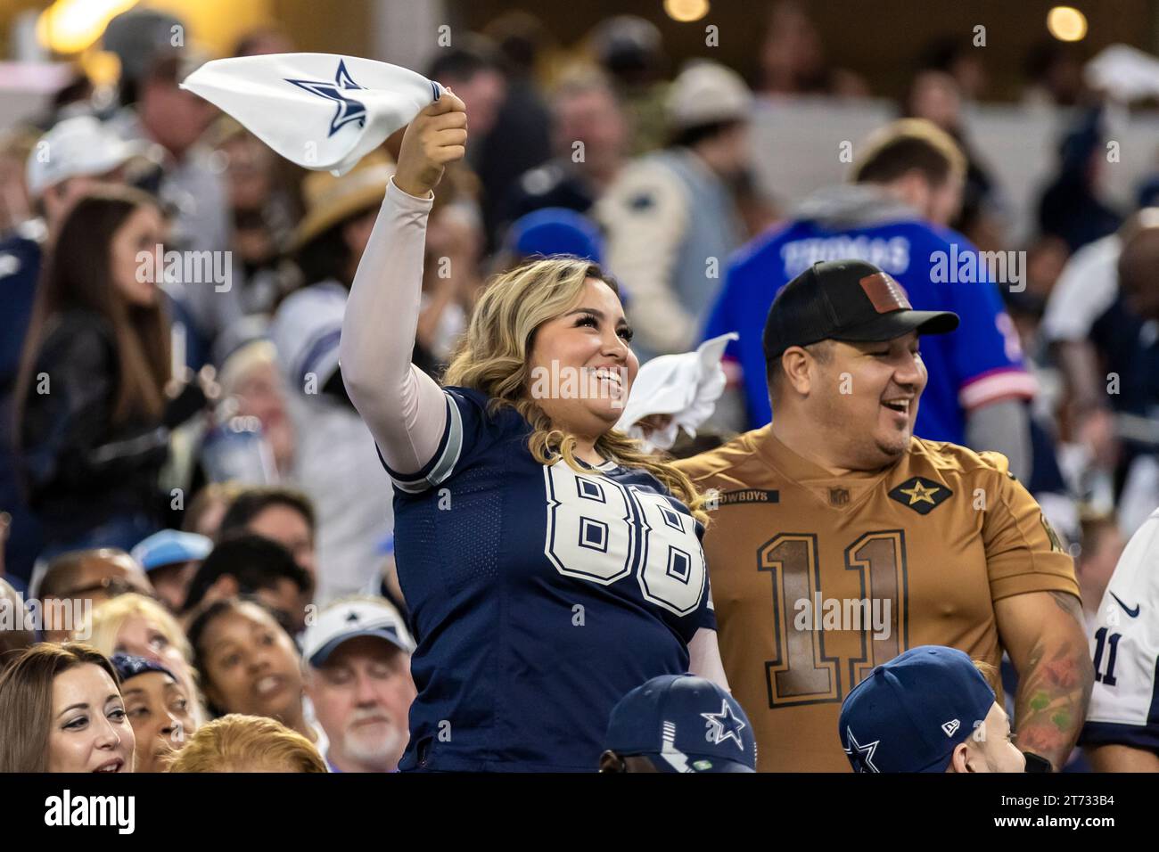 Dallas Cowboys fans cheer on their team during the first half of an NFL ...