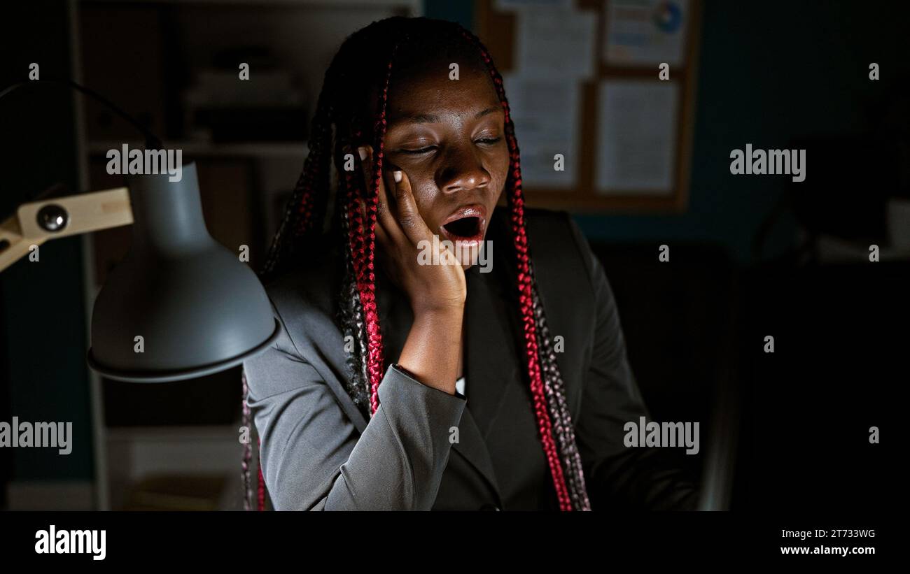Tired, overworked african american woman business worker pulling late ...