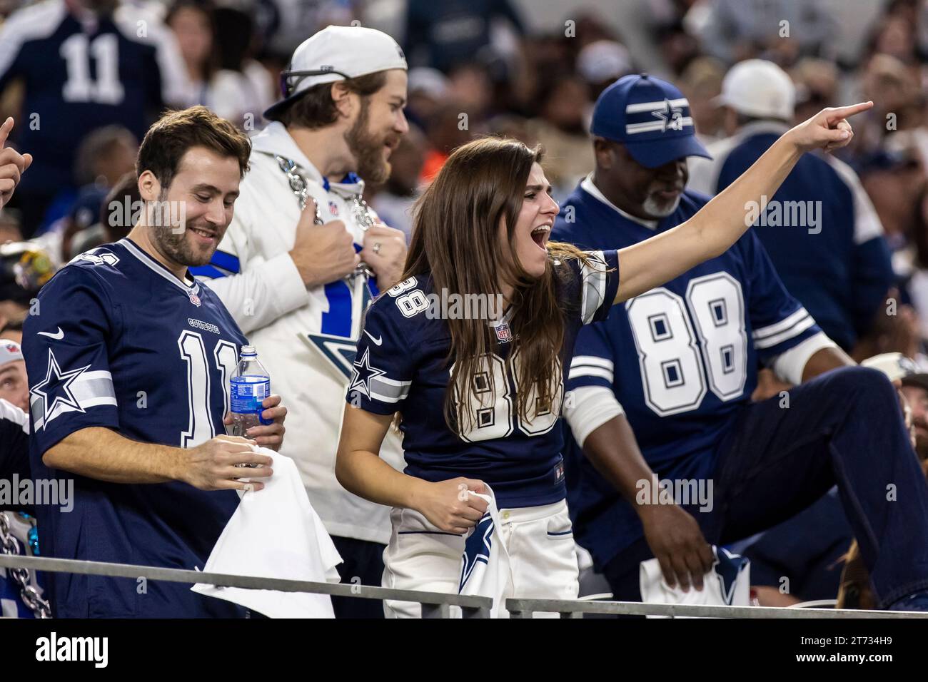 Dallas Cowboys fans cheer on their team during the first half of an NFL ...
