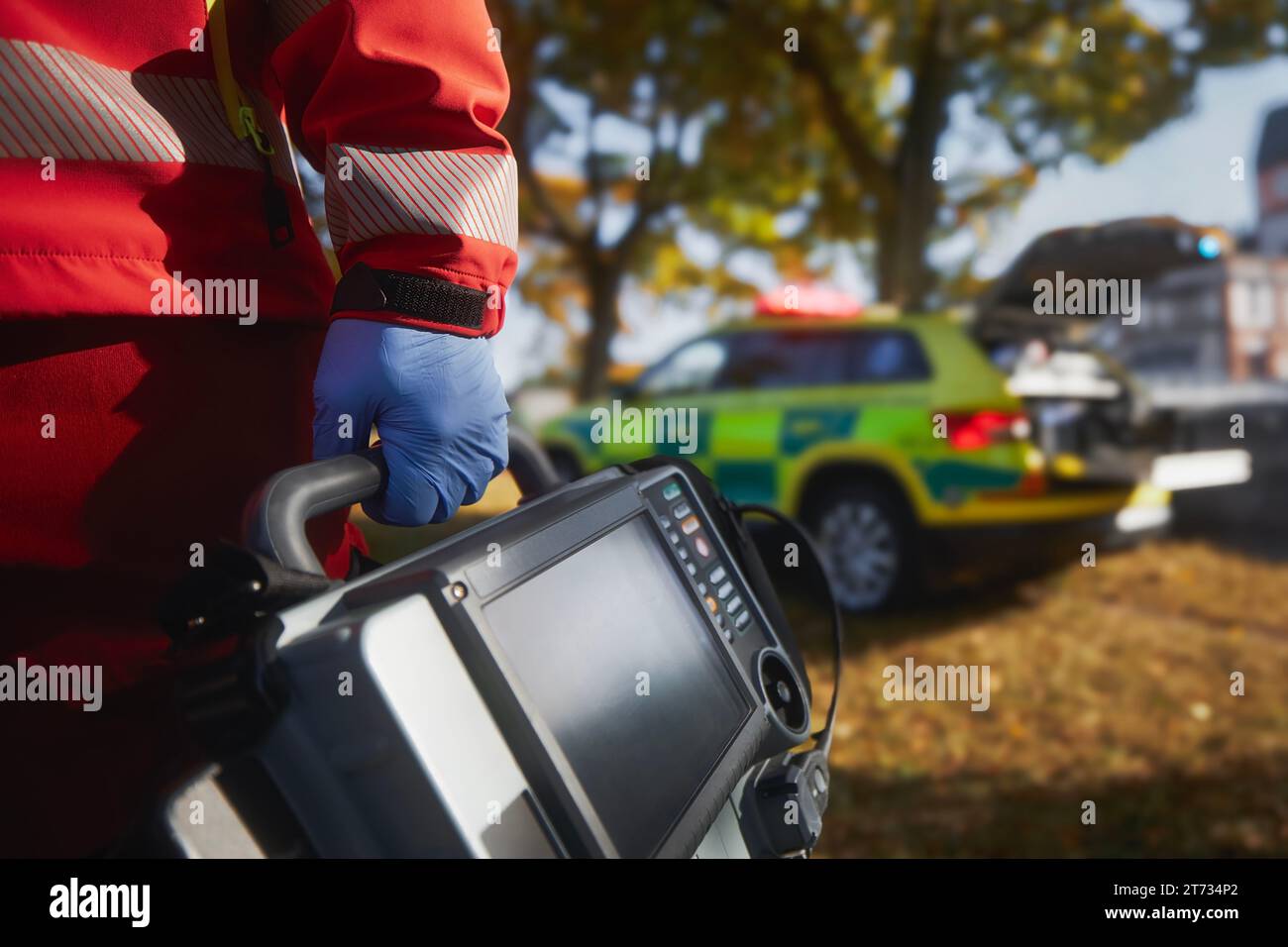 Emergency medical service. Close-up of paramedic hand in blue surgical ...