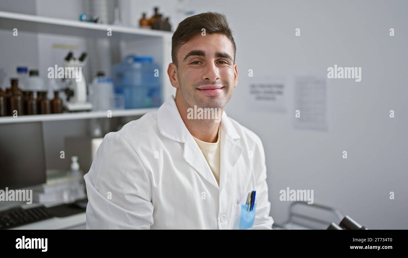 Confident young hispanic man, smiling happily as he embarks on his ...