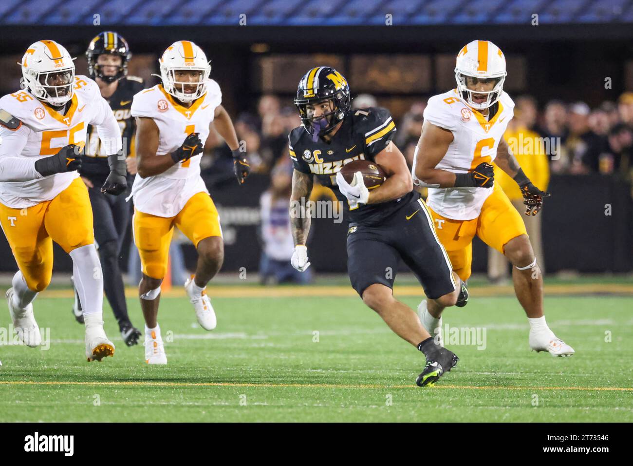COLUMBIA, MO - NOVEMBER 11: Multiple Tennessee Volunteers defenders ...