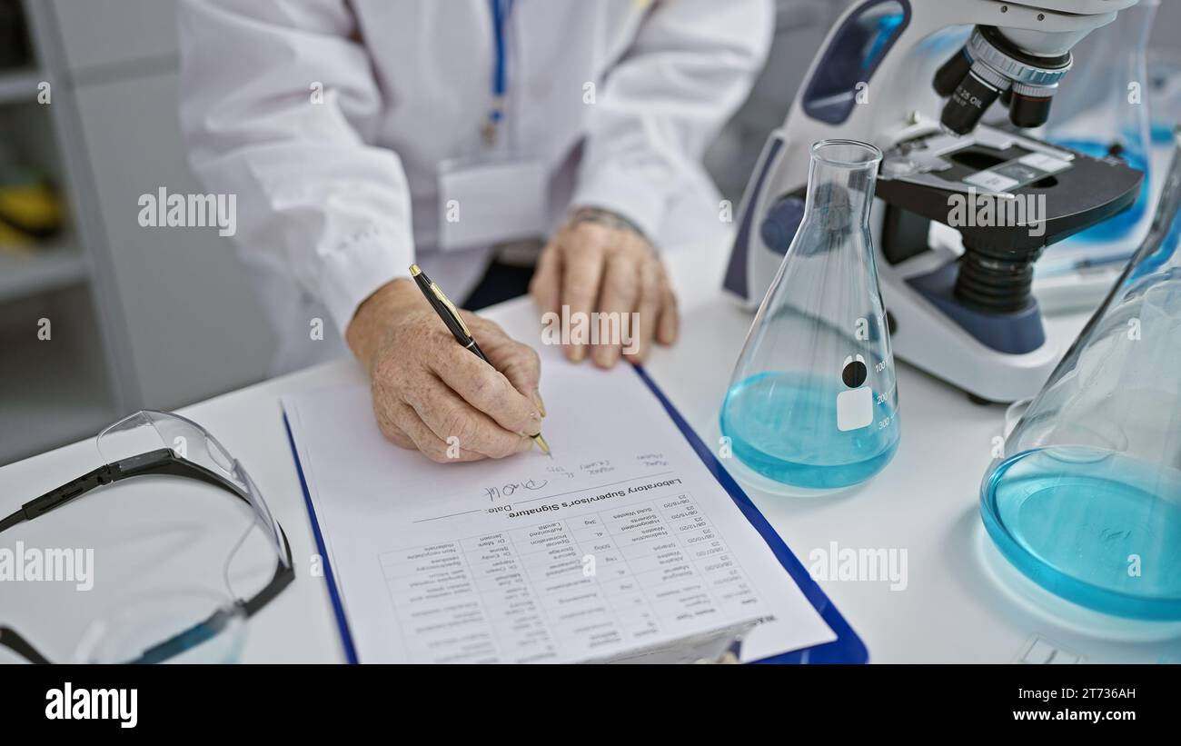 Adult hands diligently working hi-res stock photography and images - Alamy