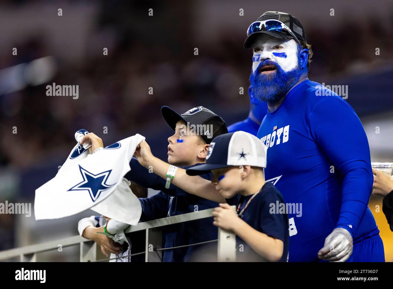 Dallas Cowboys fans cheer on their team during the second half of an ...