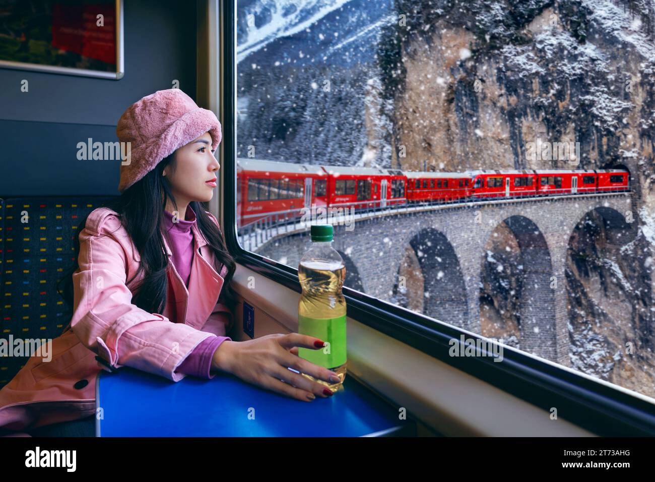 Tourist looking out the window enjoying with Train passing through ...