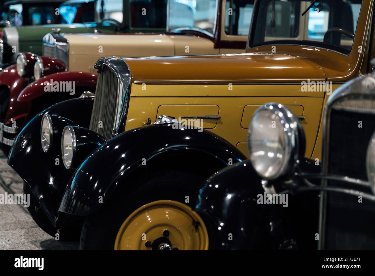 car nose with large headlights and black wheels Stock Photo - Alamy