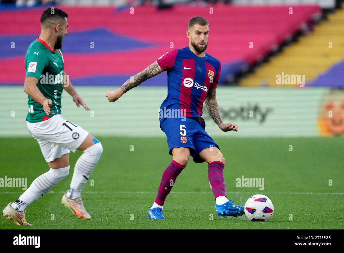 Inigo Martinez of FC Barcelona and Luis Rioja of Deportivo Alaves ...