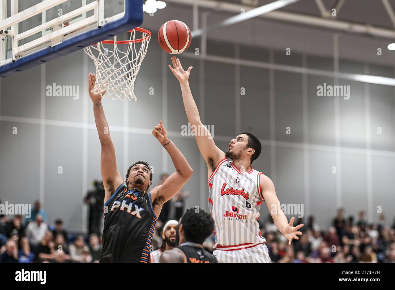 TJ Lall of Leicester Riders attacks the basket during the British ...