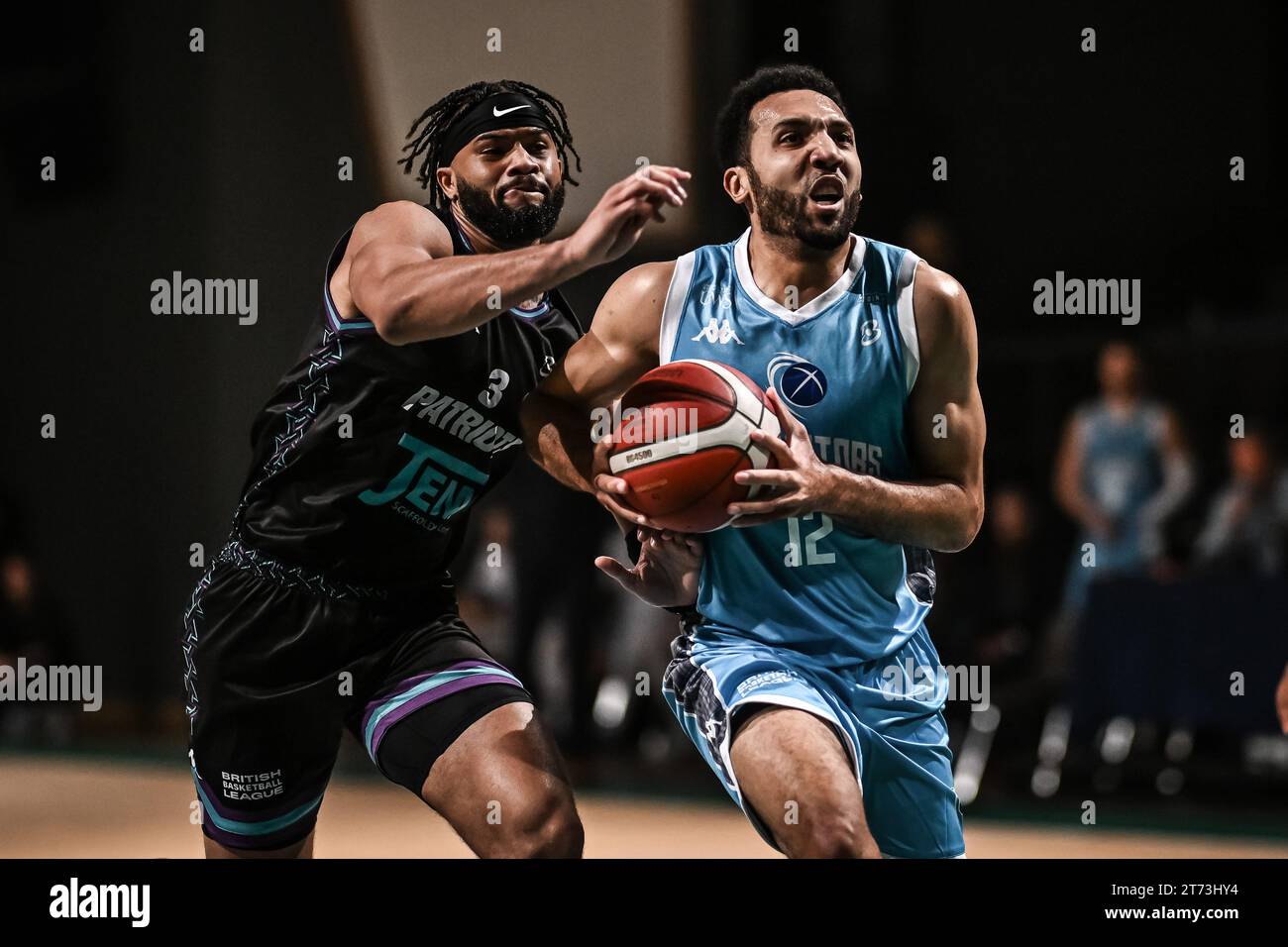 Patrick Whelan #12 of Caledonia Gladiators breaks past Jacob Wiley #3 ...