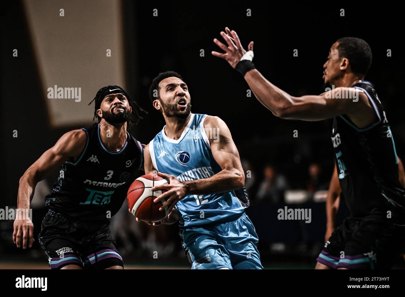 Patrick Whelan #12 of Caledonia Gladiators breaks past Jacob Wiley #3 ...