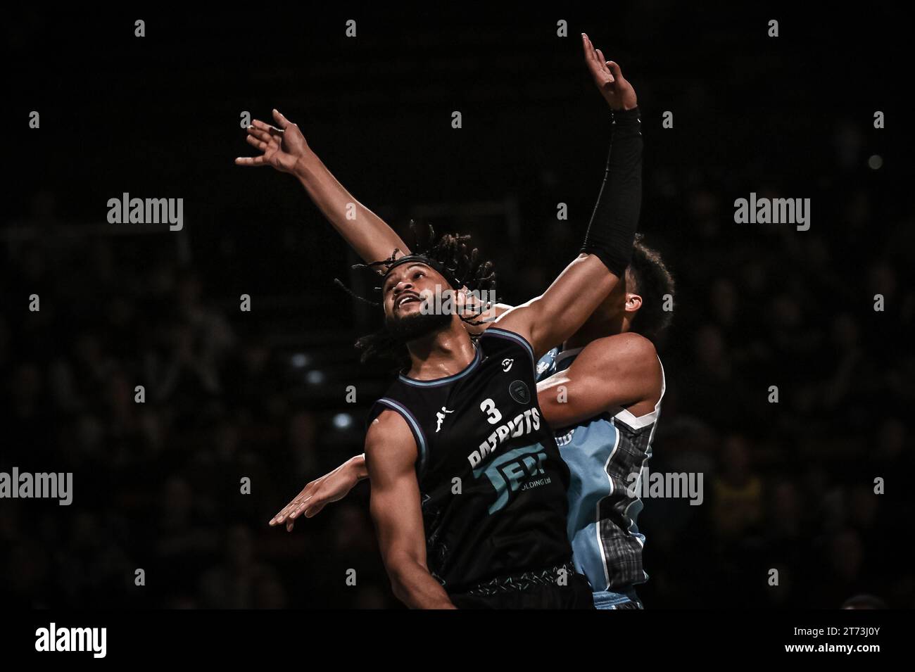 Jacob Wiley #3 of Plymouth City Patriots and Clifton Moore Jr. #21 of ...